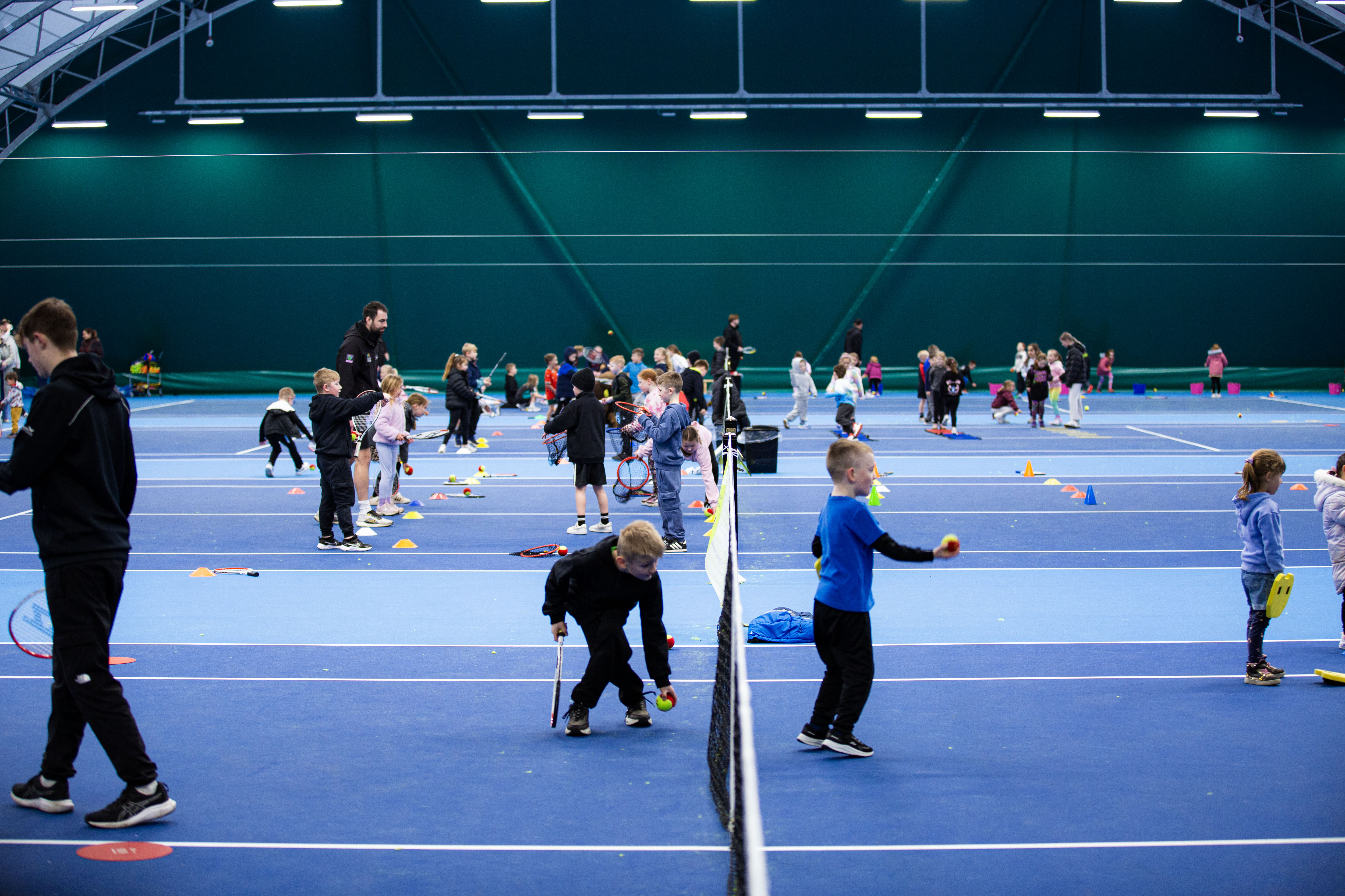 Hundreds of children enjoy tennis during schools roadshow visit to Moray